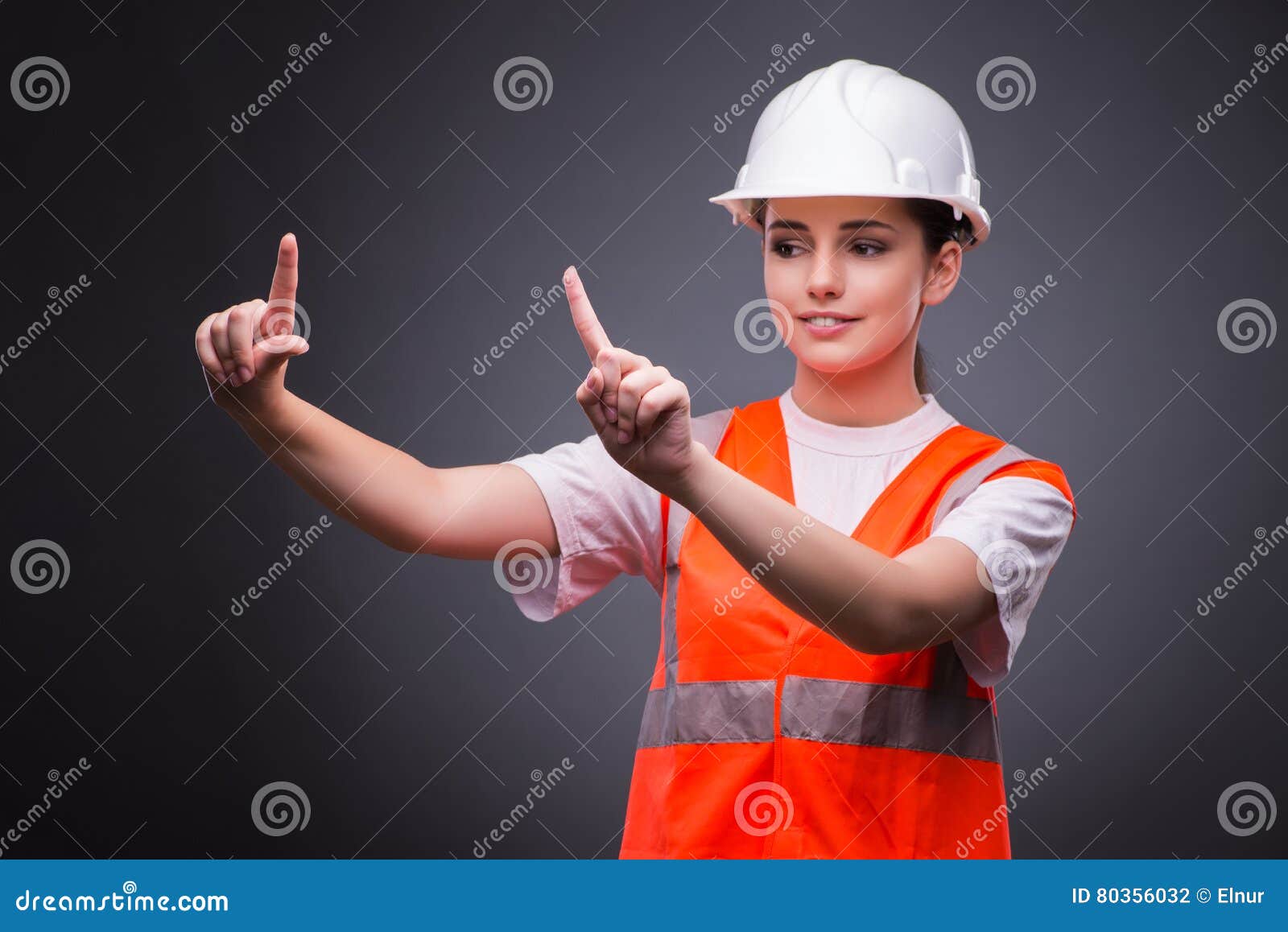 The Cute Construction Worker Pressing Virtual Buttons Stock Photo ...