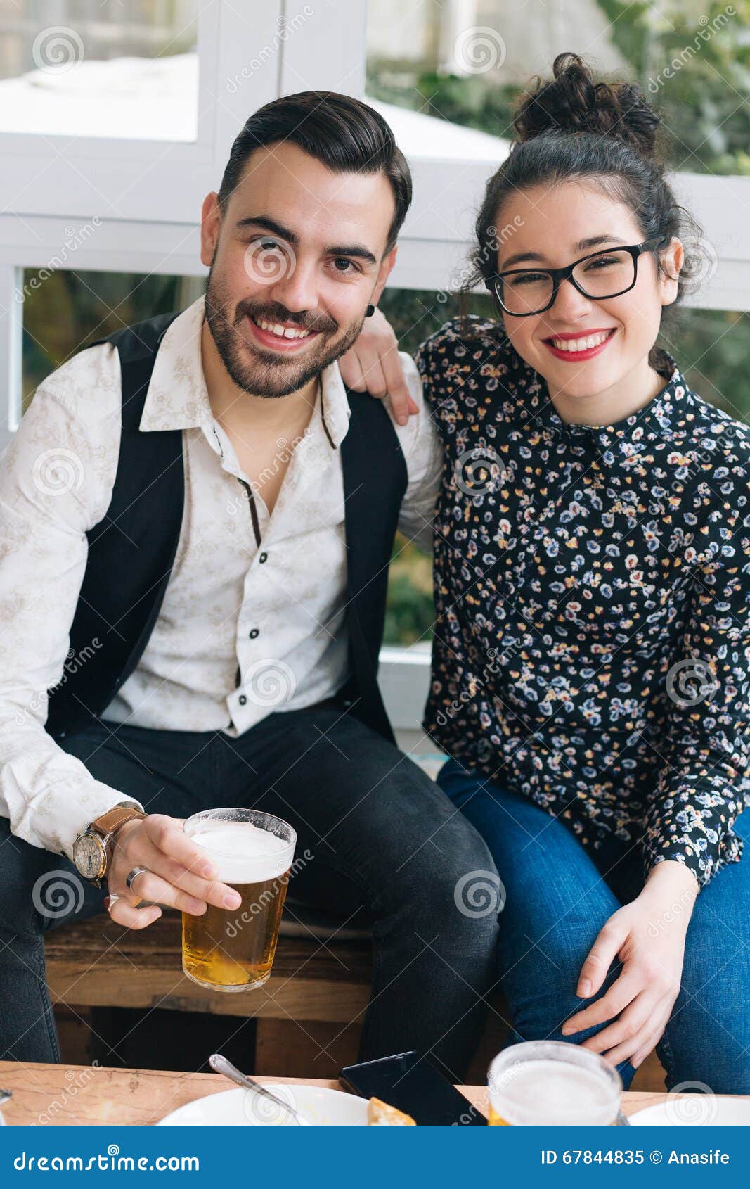 Cute couple in a bar stock image. Image of beard, fashion - 67844835