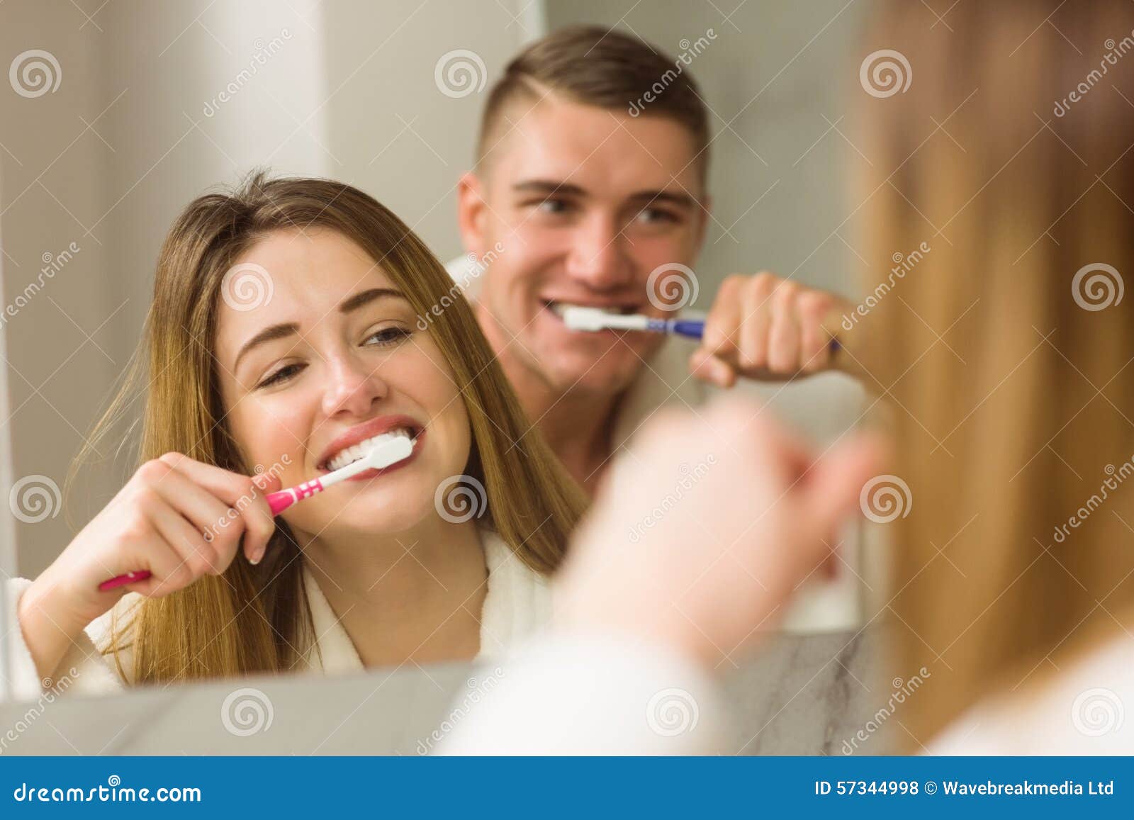 Cute Couple Brushing Their Teeth Stock Photo - Image of domicile, gown ...