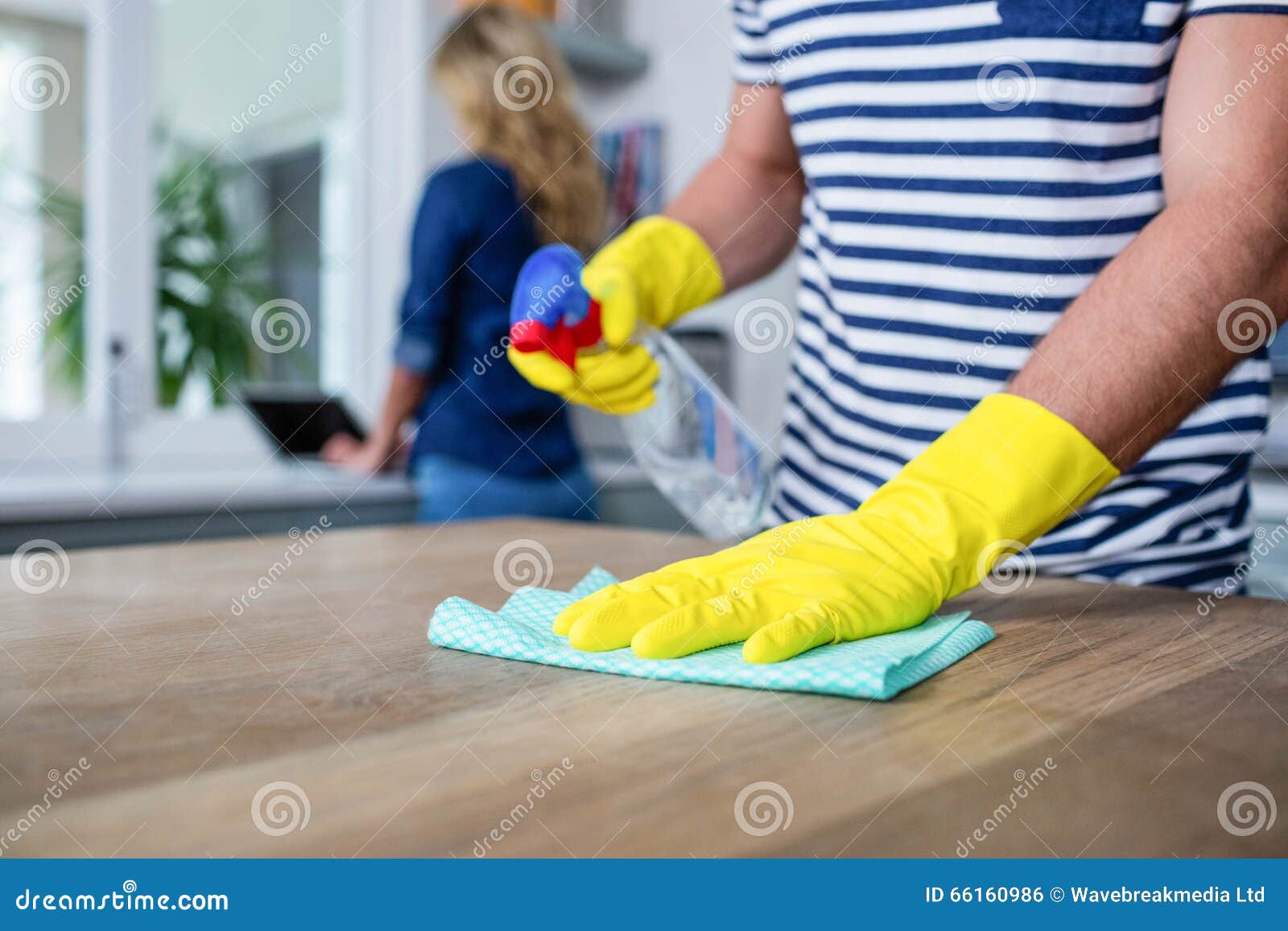 Cute couple cleaning up stock photo. Image of detergents - 66160986