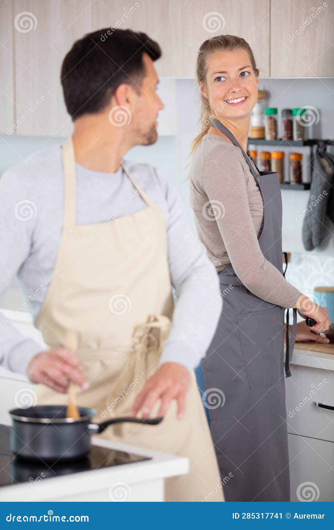 Cute Couple Cooking Together in Kitchen Stock Image - Image of male ...