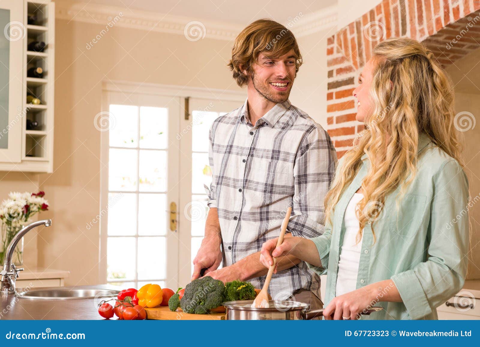 Cute Couple Cooking Together Stock Image - Image of counter, indoors ...