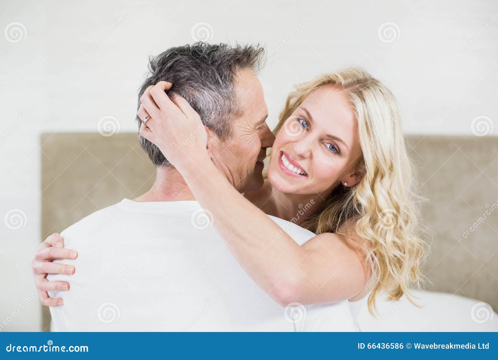 Cute Couple Cuddling in Bed Stock Photo - Image of domestic, domicile ...