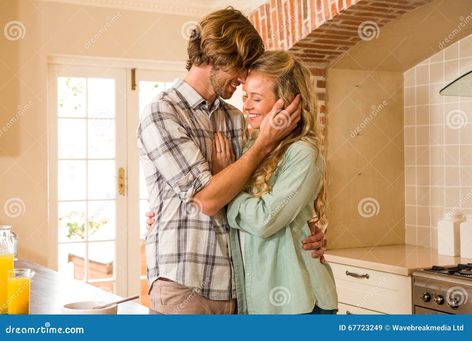Cute couple cuddling stock image. Image of domestic, beautiful - 67723249