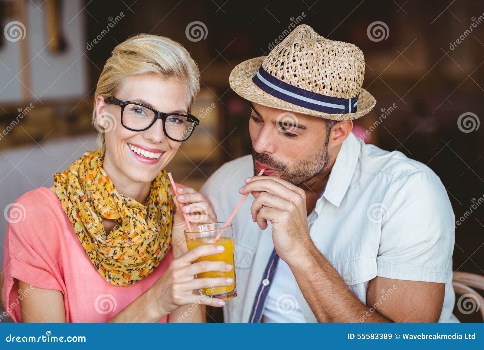 Cute Couple on a Date Sharing an Orange Juice Stock Image - Image of ...