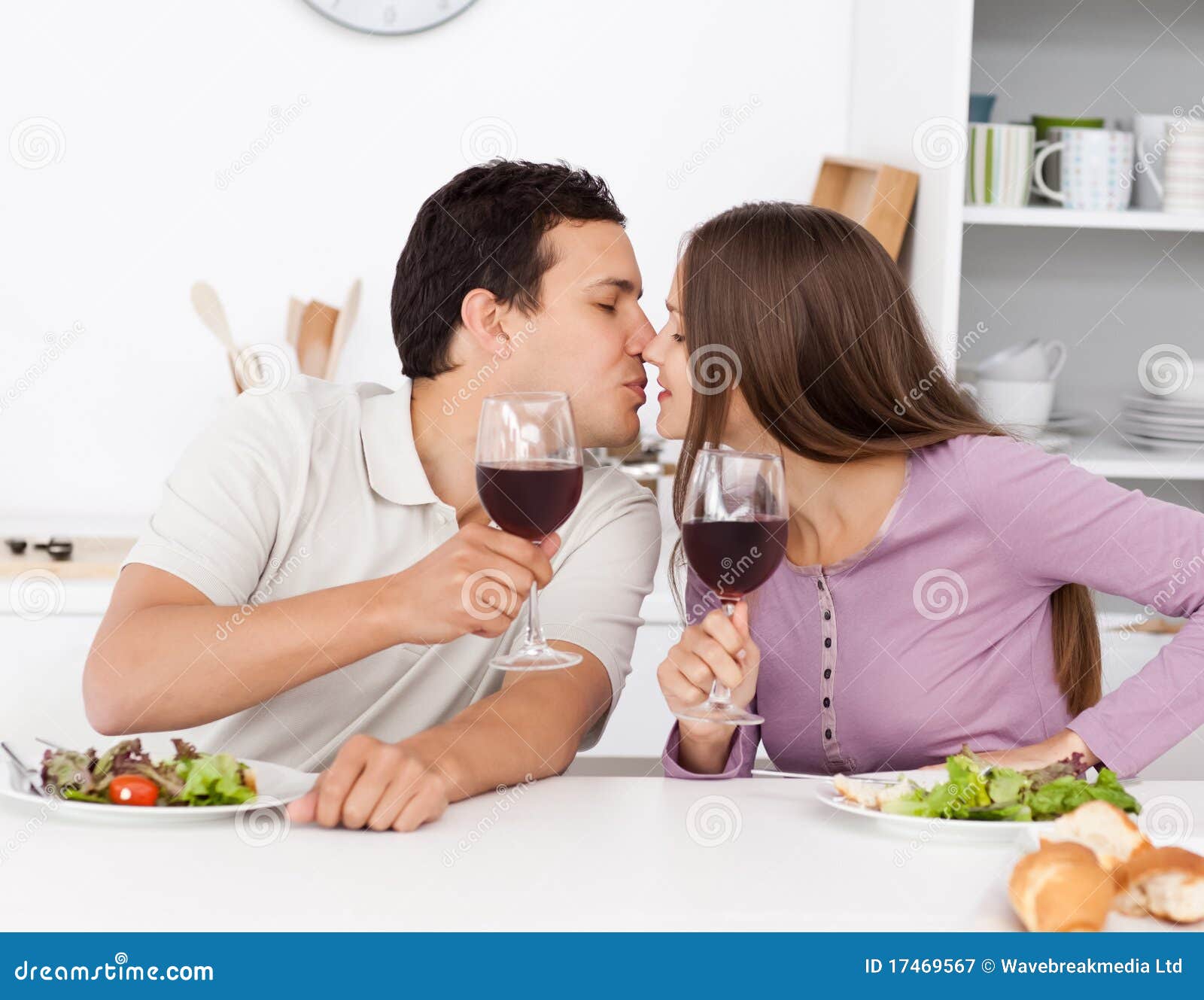 Cute Couple Giving a Toast while Having Lunch Stock Image - Image of ...