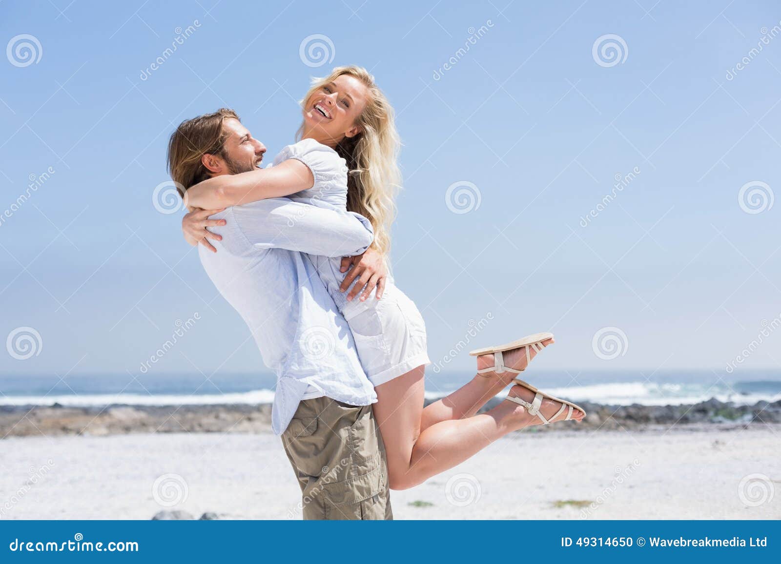 Cute Couple Hugging on the Beach Stock Photo - Image of hair, fair ...