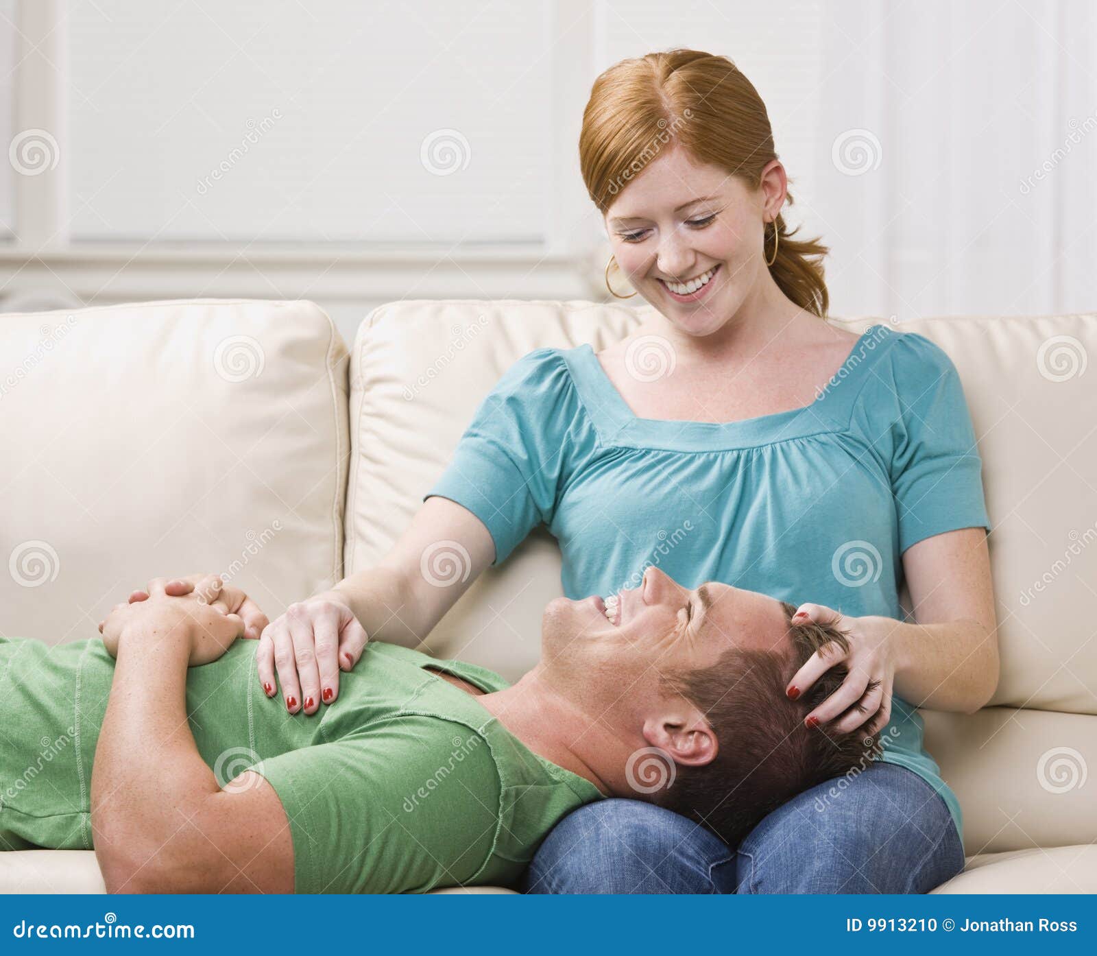 Cute Couple Lounging stock photo. Image of laughter, casual - 9913210