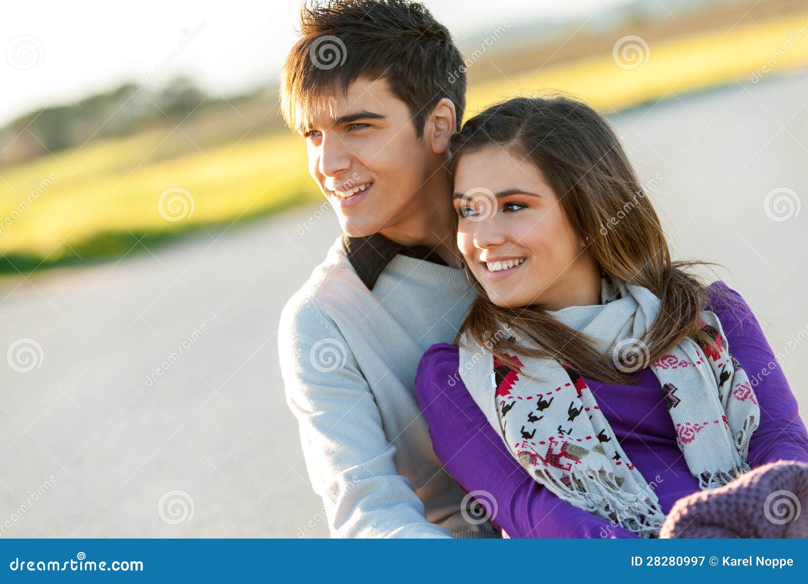 Cute Couple Sitting Together Outdoors. Stock Image - Image of lifestyle ...