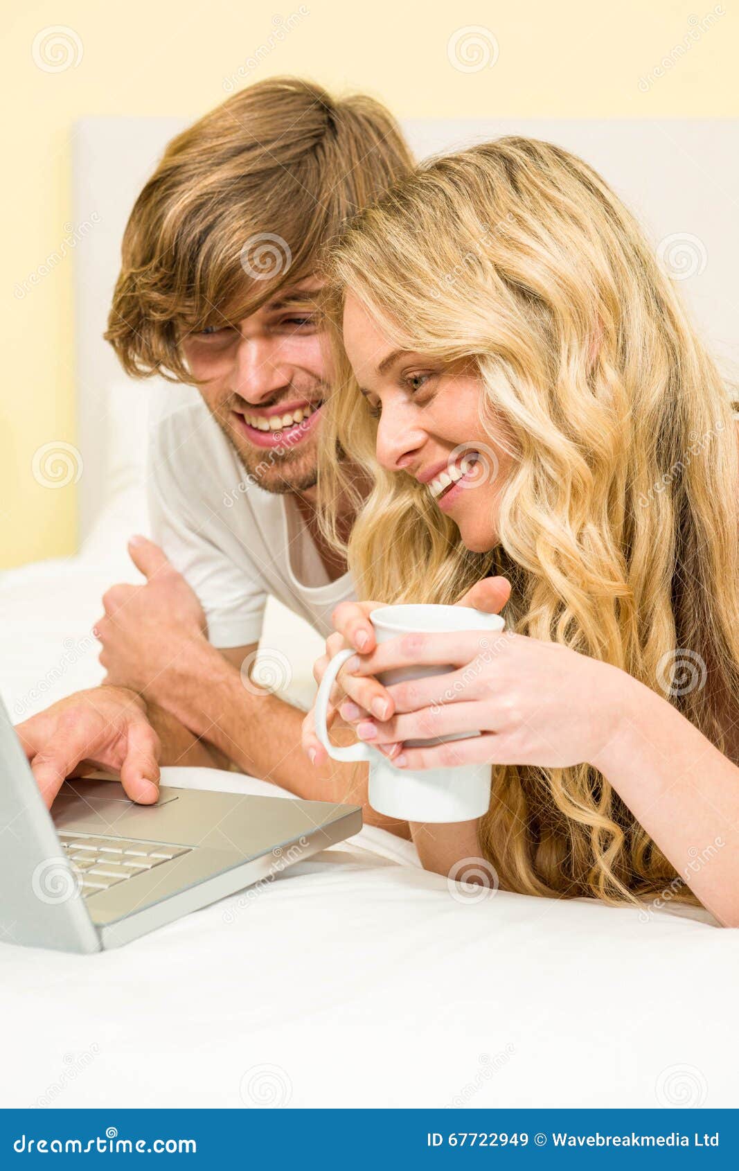 Cute couple using laptop stock image. Image of life, caucasian - 67722949