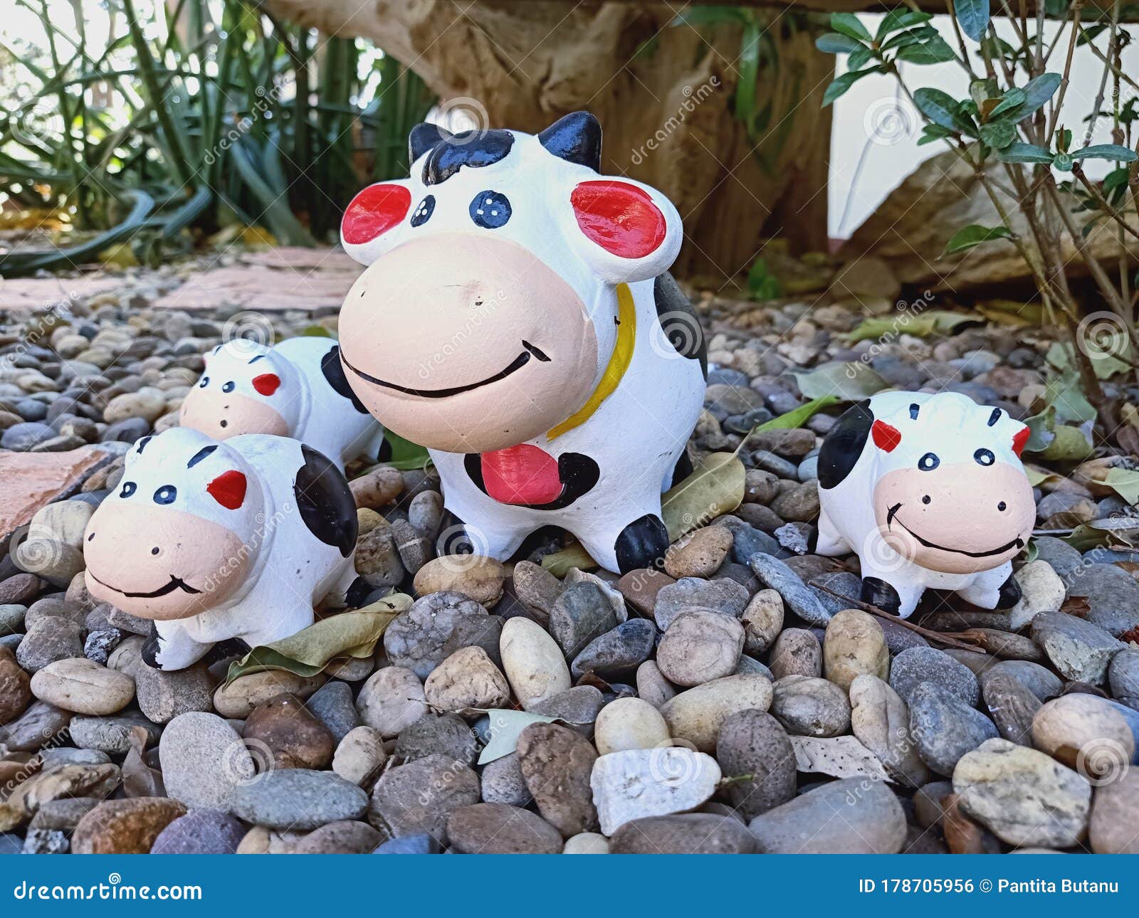 A Cute Cows for Decorate a Garden Stock Photo - Image of cows, cute ...