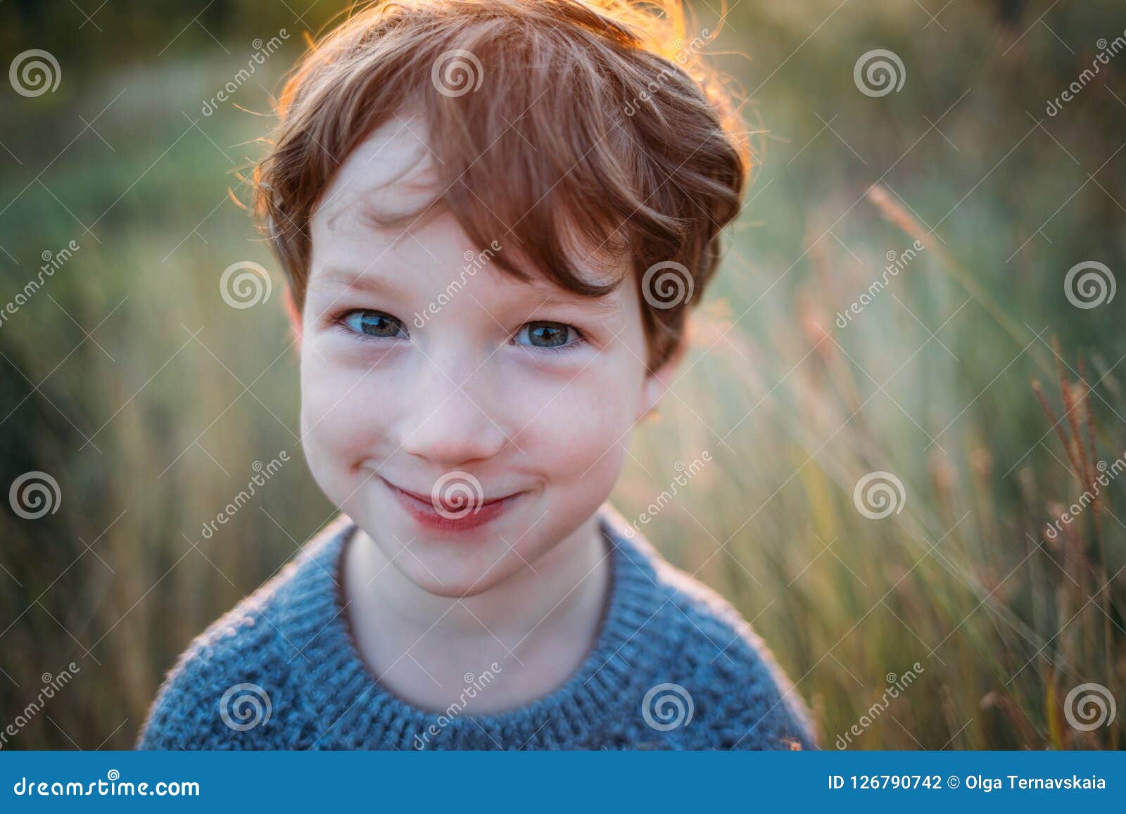 Cute Curly Boy, a Sly Look at the Camera, Close-up Portrait. Stock ...