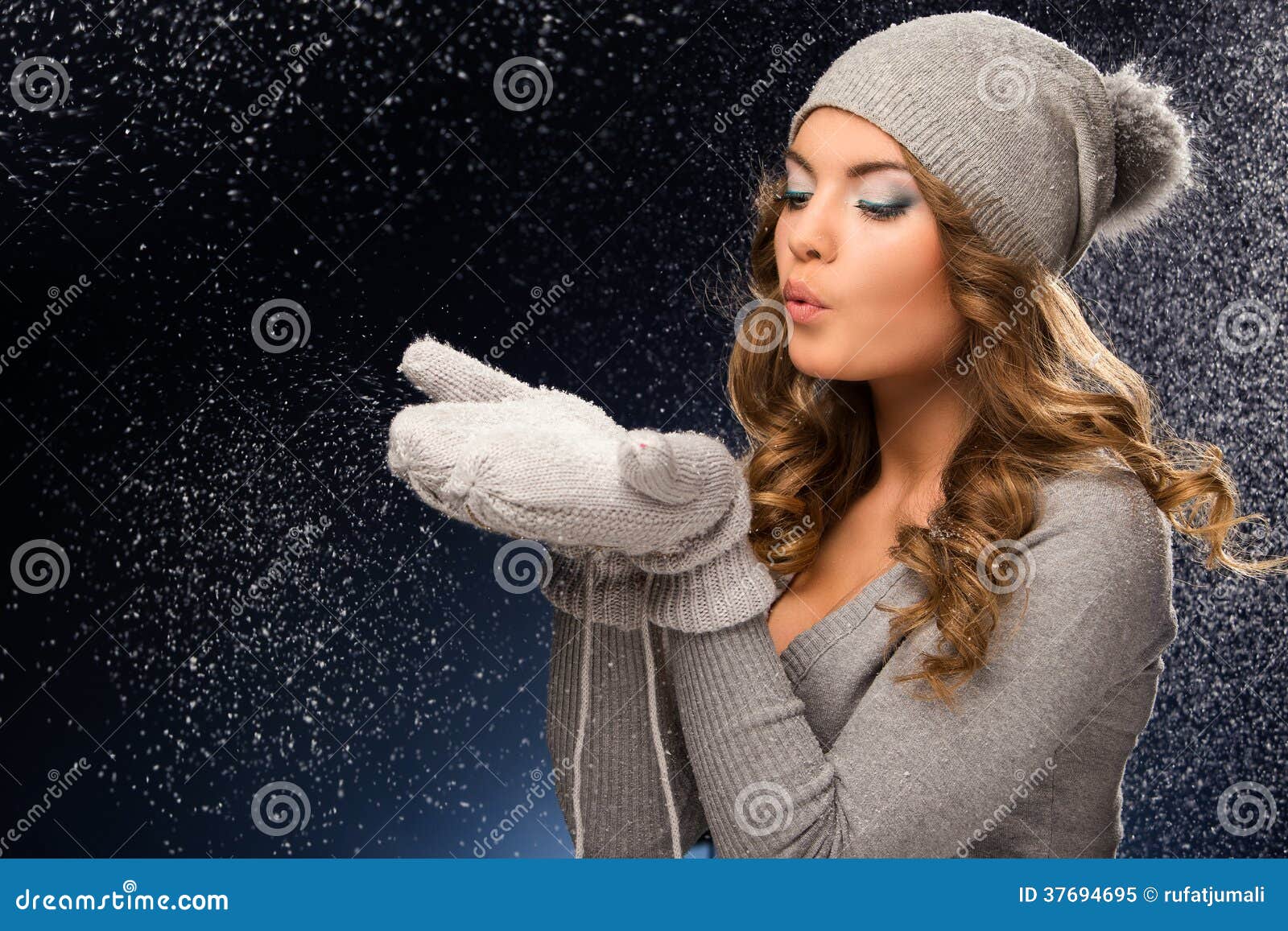 Cute Curly Girl Wearing Mittens during Snowfall Stock Image - Image of ...