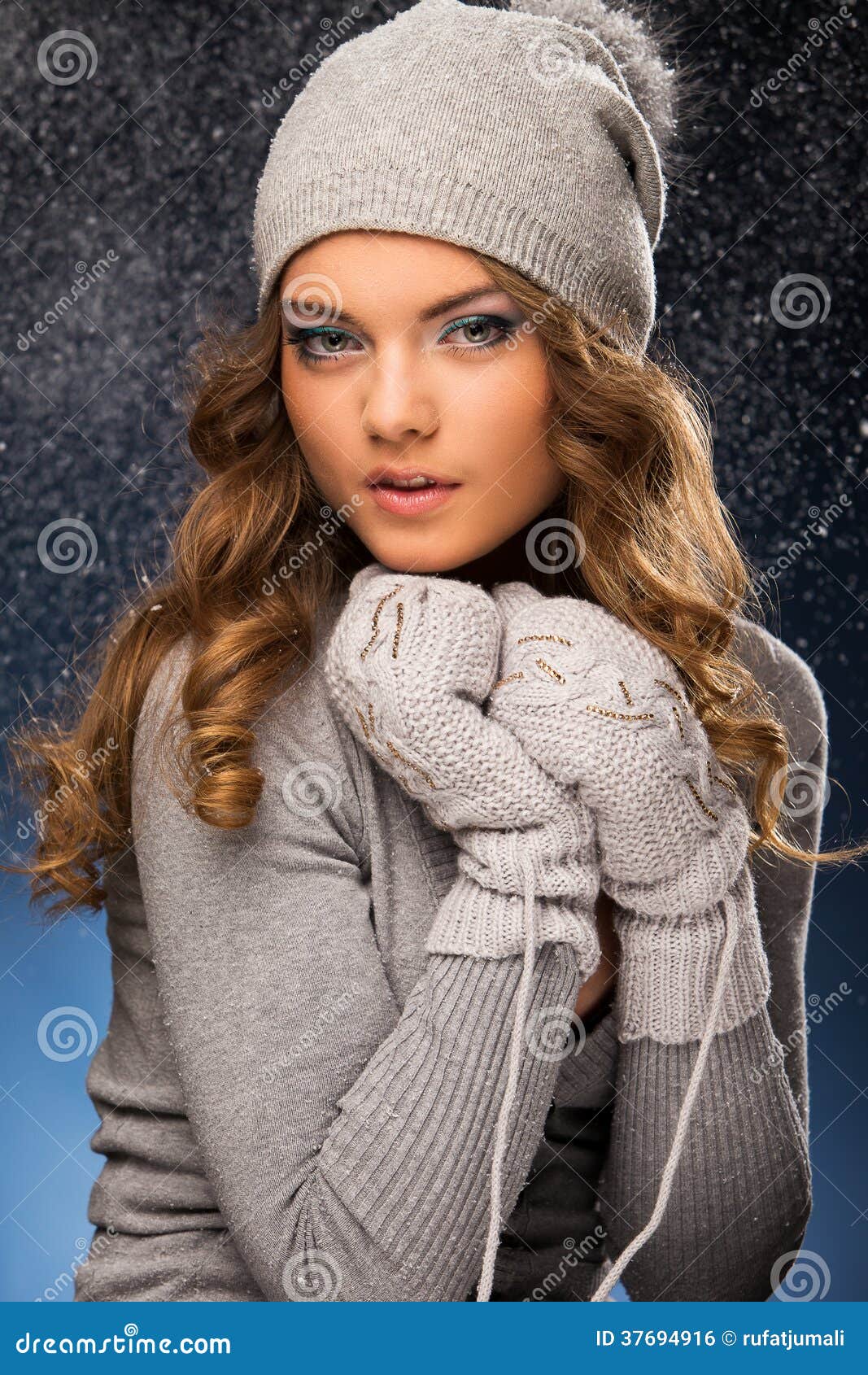 Cute Curly Girl Wearing Mittens during Snowfall Stock Photo - Image of ...