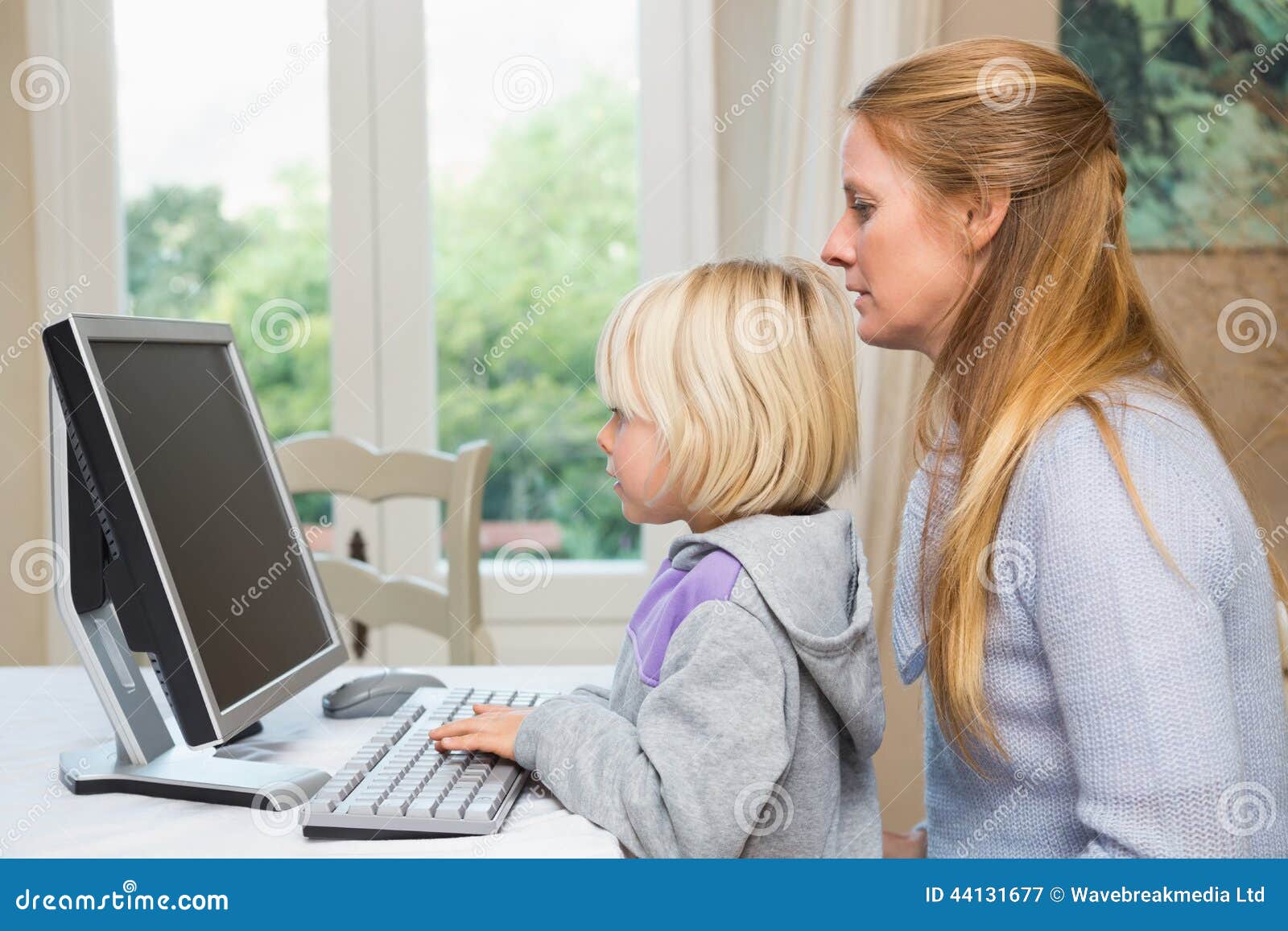 Cute Daughter and Mother Using Computer Stock Image - Image of ...