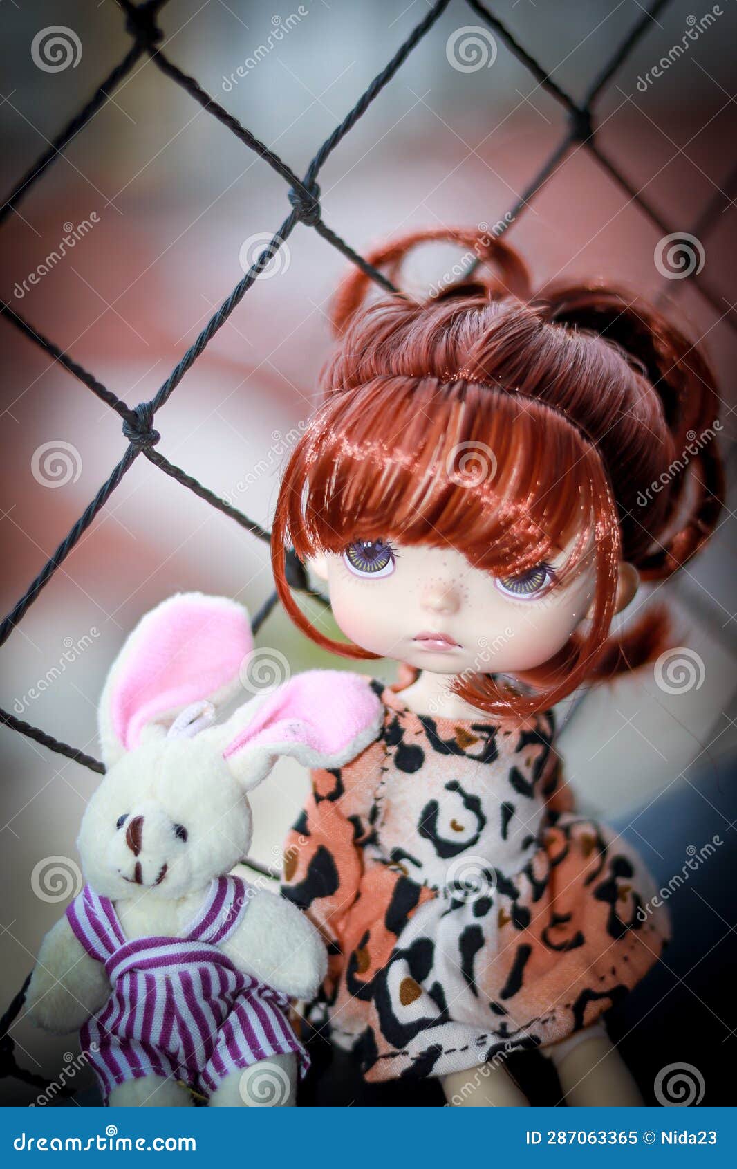 Cute Doll with rabbit stock image. Image of textile - 287063365