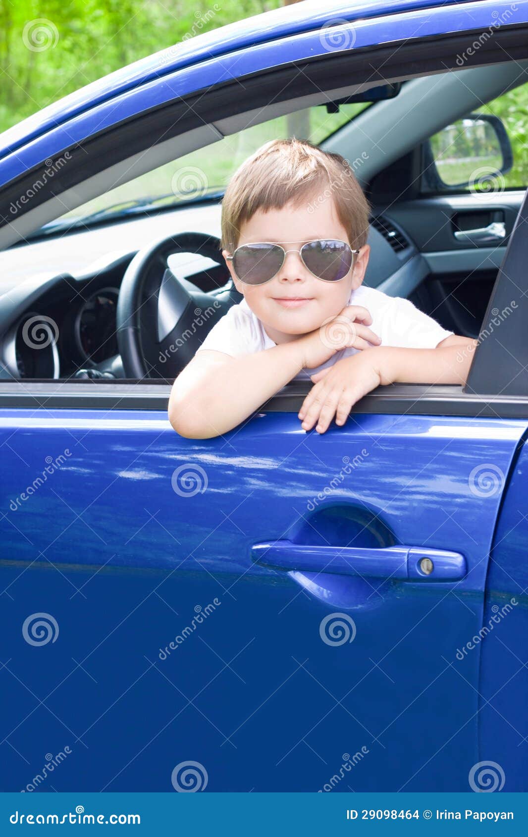 Cute driver in blue car stock photo. Image of childhood - 29098464