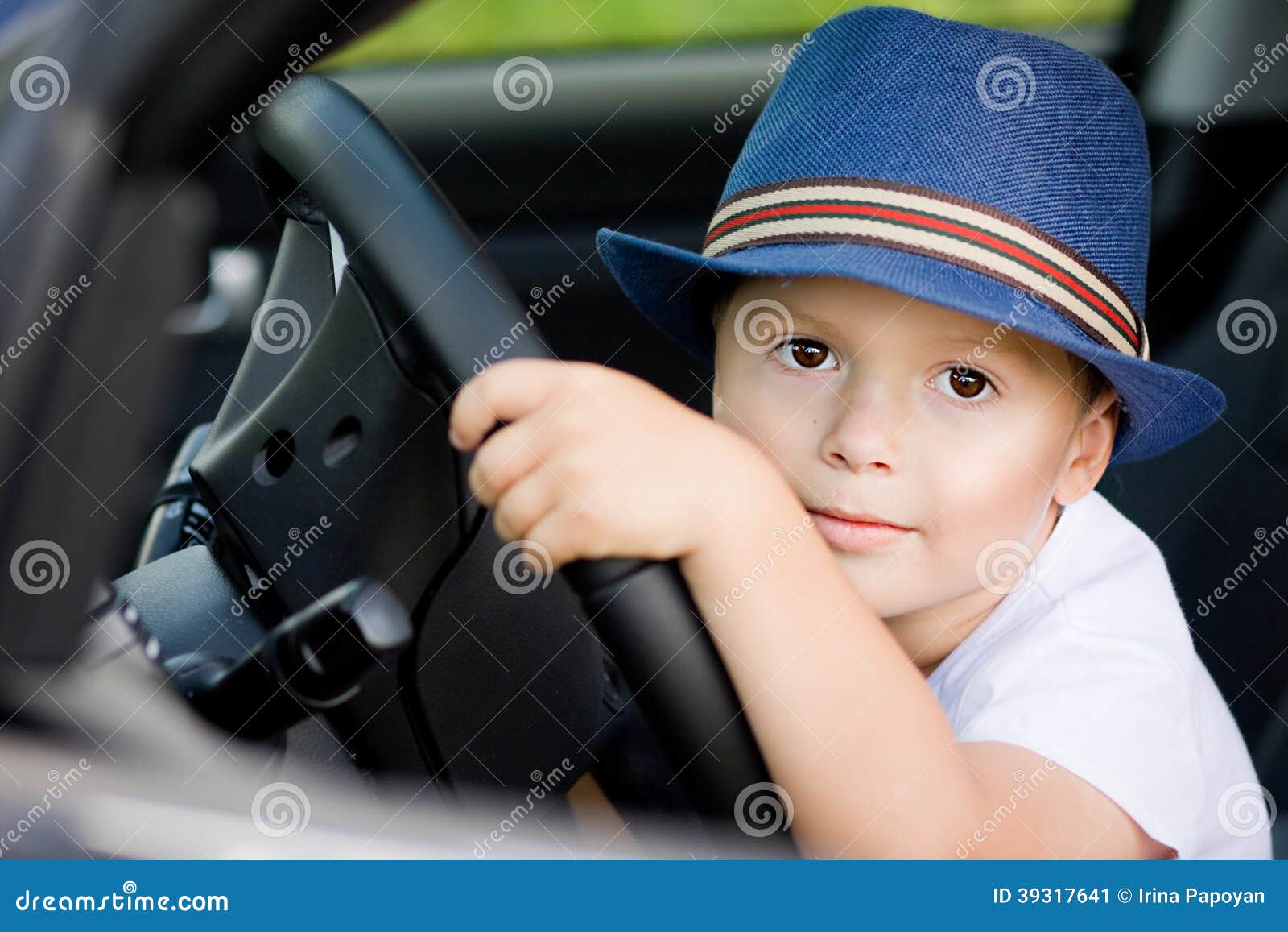 Cute driver in hat in car stock image. Image of offspring - 39317641