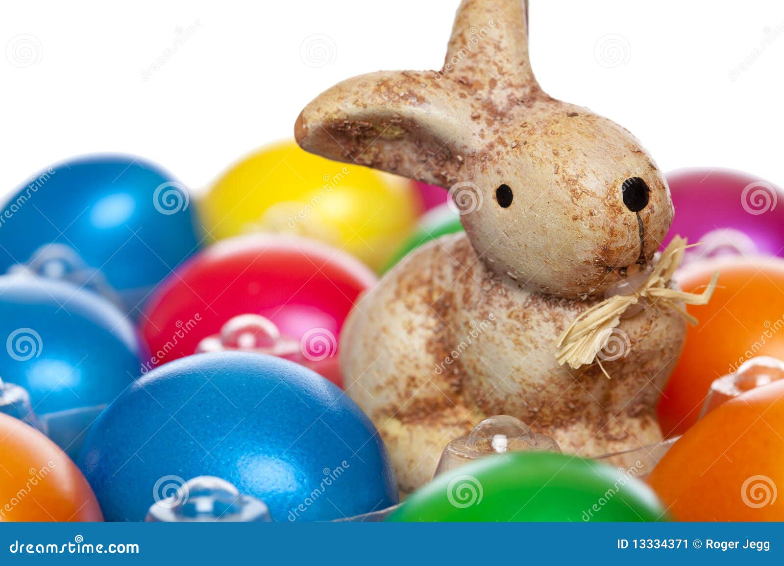 Cute Easter Bunny Sitting between Easter Eggs Stock Image - Image of ...