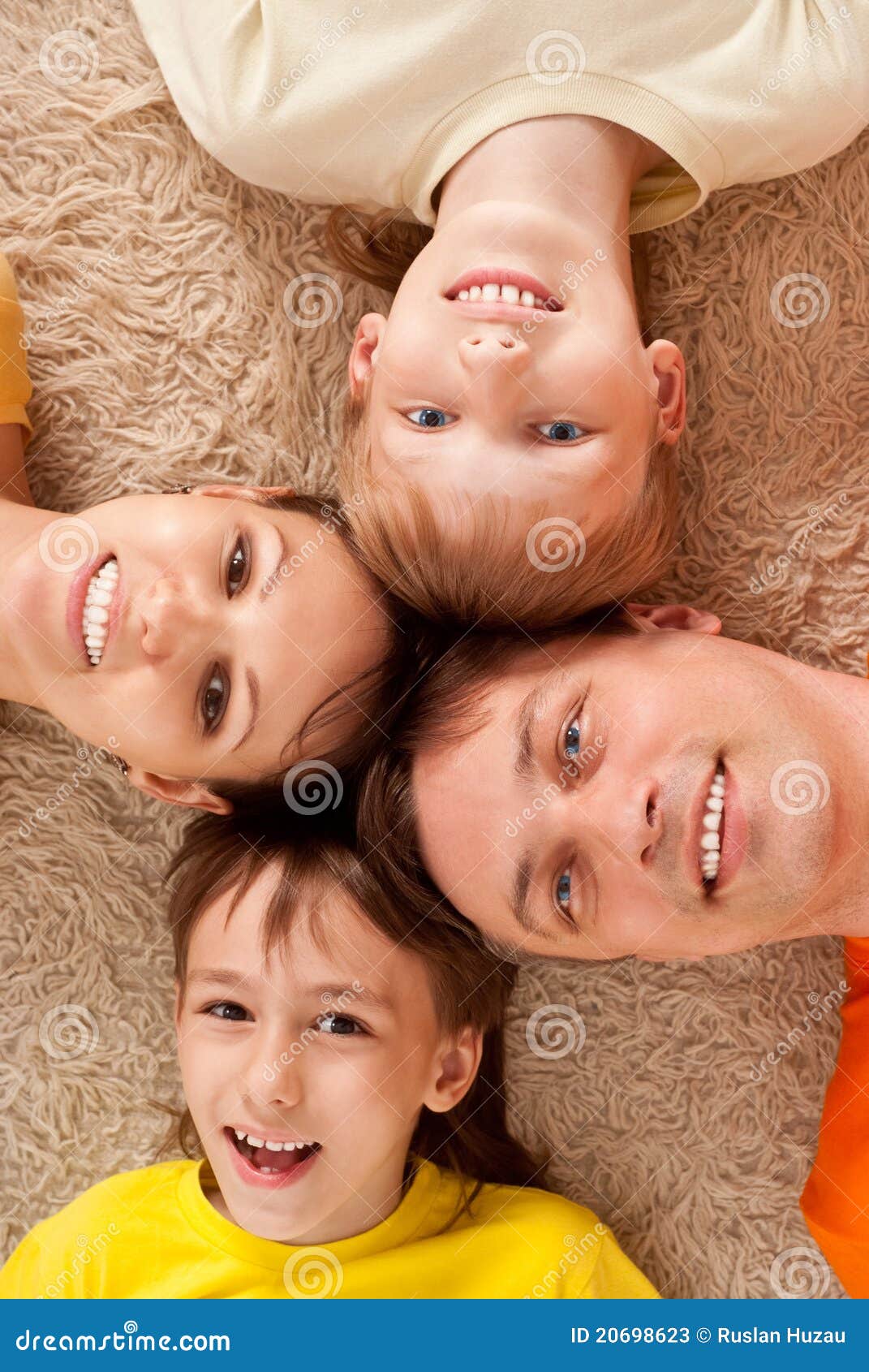 Cute family on carpet stock image. Image of health, relations - 20698623