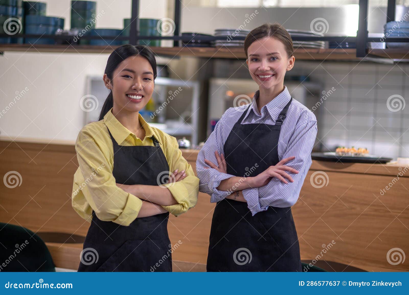 Cute Female Colleagues at the Working Place at the Cafe Stock Image ...