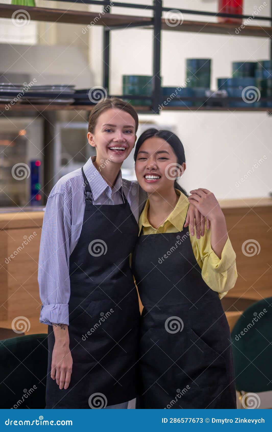 Cute Female Colleagues at the Working Place at the Cafe Stock Image ...