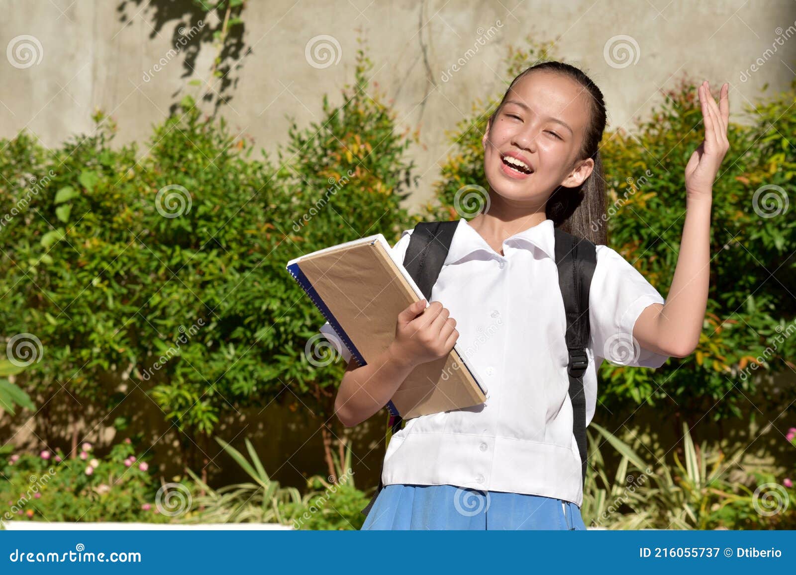 Cute Female Student Laughing with Books Stock Image - Image of ...