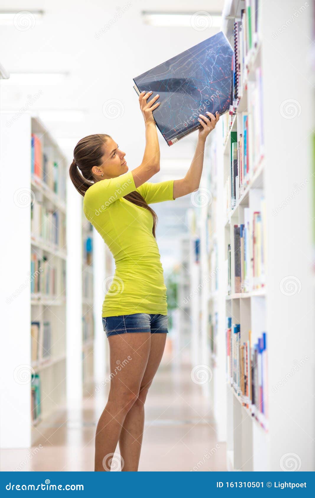 Cute Female University Student in Library Stock Image - Image of ...