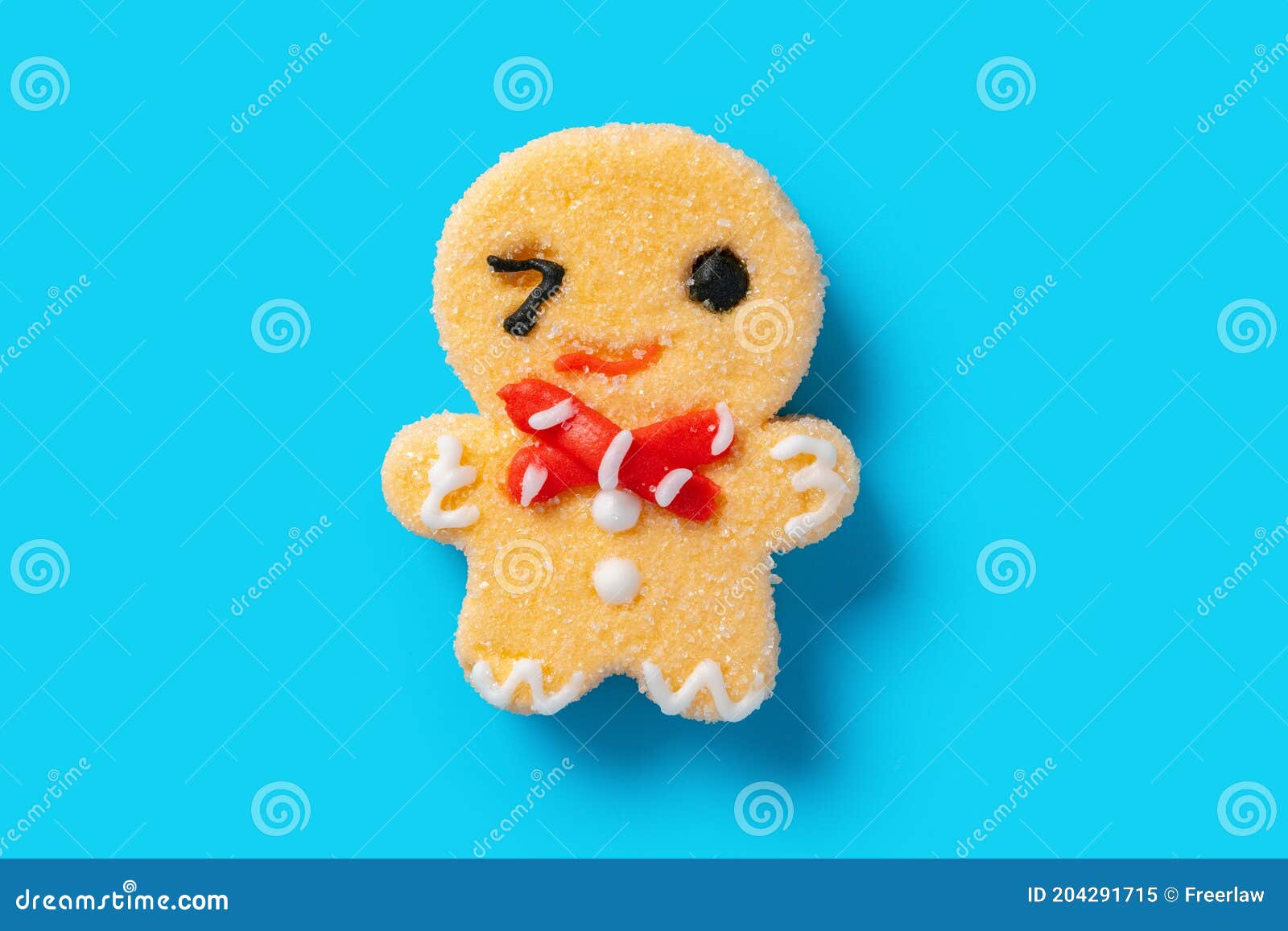 A Cute Gingerbread Shape Candy on a Blue Background Stock Image - Image ...