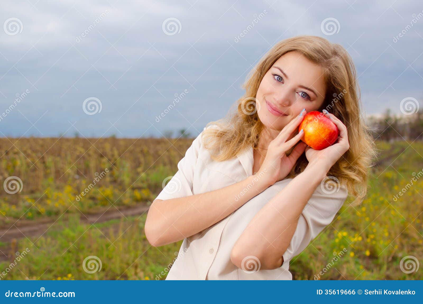 Cute girl with apple stock photo. Image of person, european - 35619666