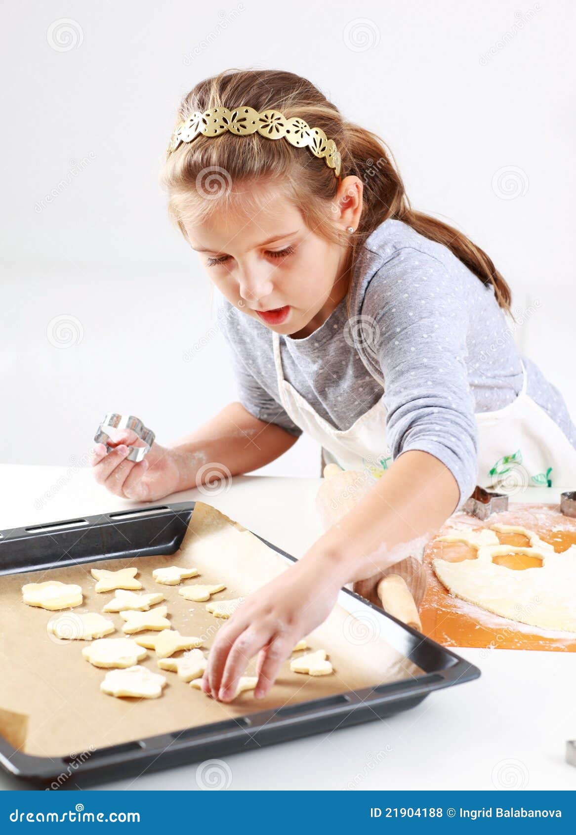Cute girl baking cookies stock photo. Image of cutter - 21904188