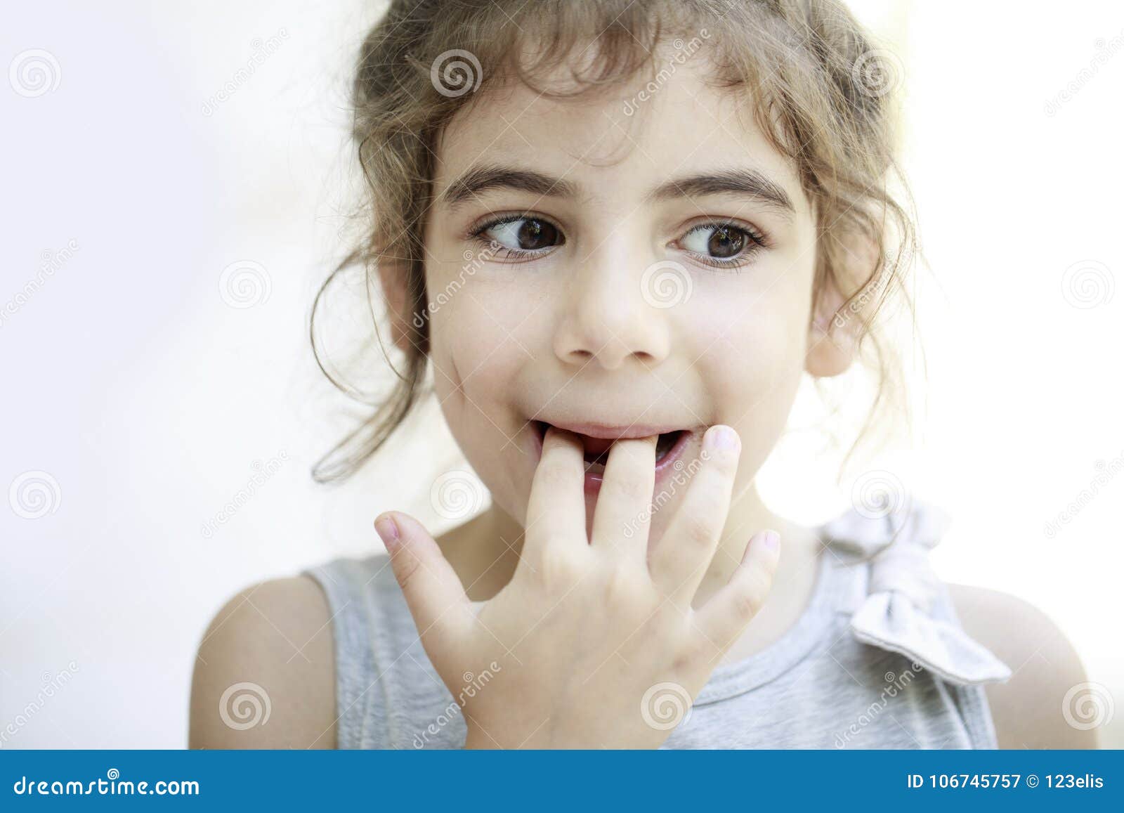 Cute girl stock image. Image of child, isolated, biting - 106745757