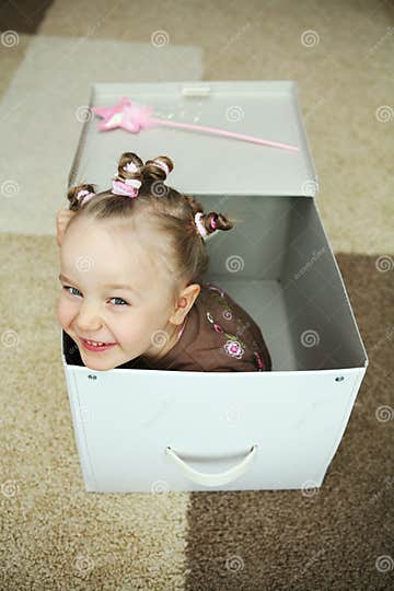 Cute Girl in Box stock image. Image of female, person - 2374829