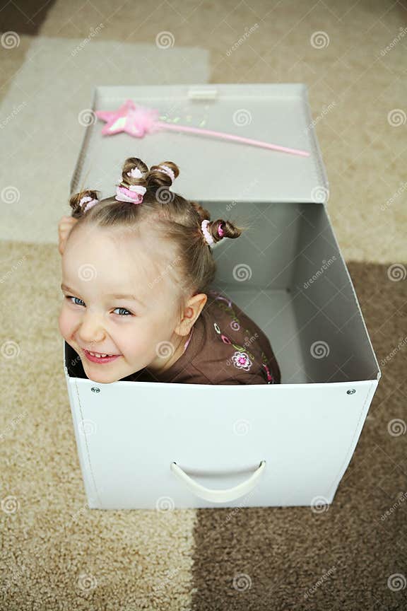 Cute Girl in Box stock image. Image of female, person - 2374829