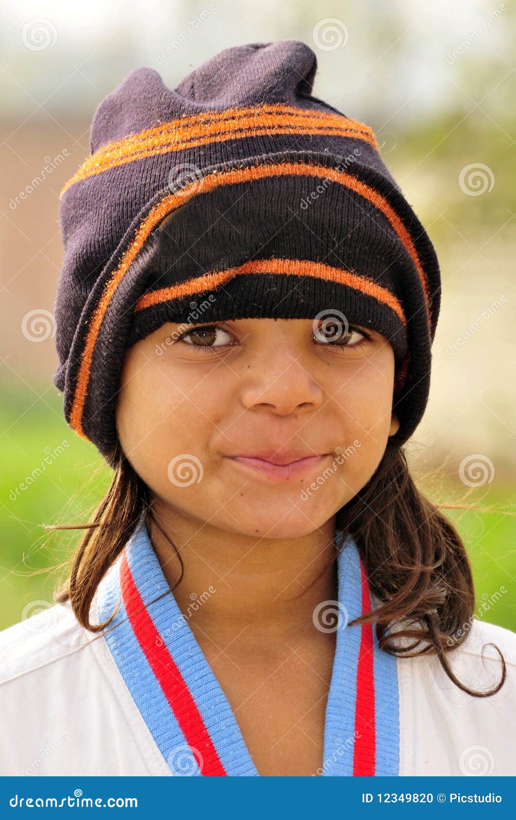 Cute girl with cap stock photo. Image of india, people - 12349820