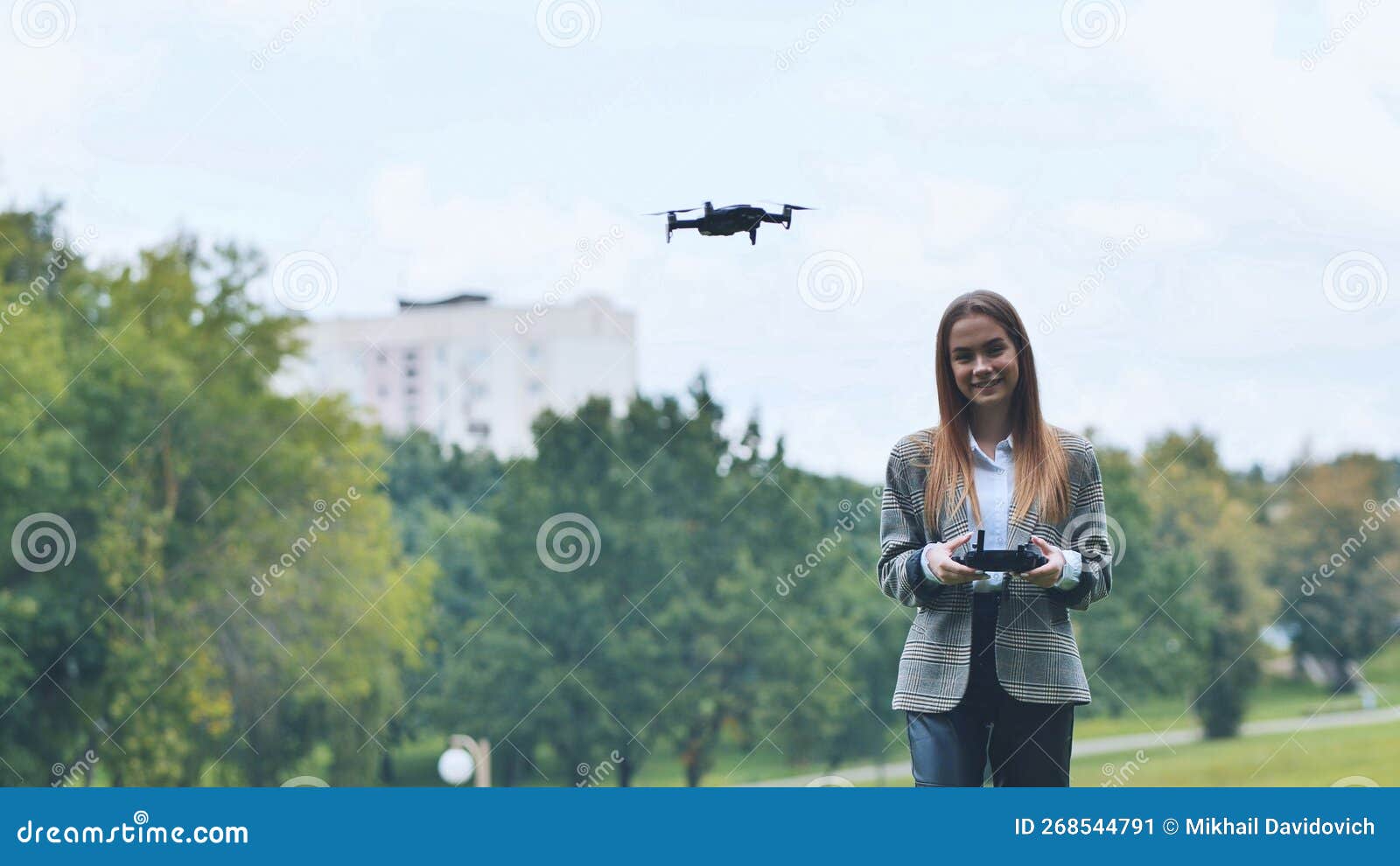 A Cute Girl Controls a Drone in the Park. Stock Image - Image of beauty ...