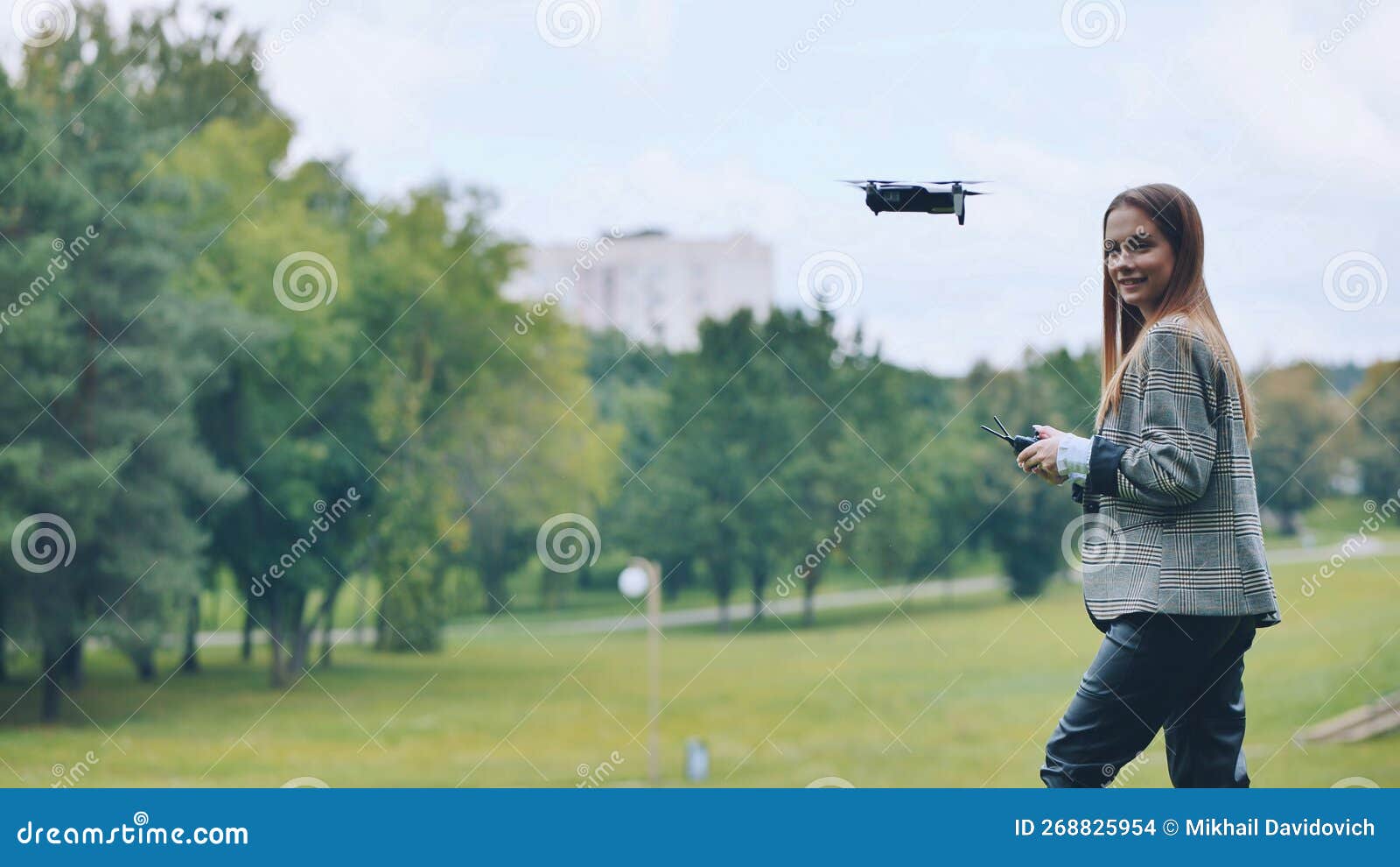 A Cute Girl Controls a Drone in the Park. Stock Photo - Image of future ...