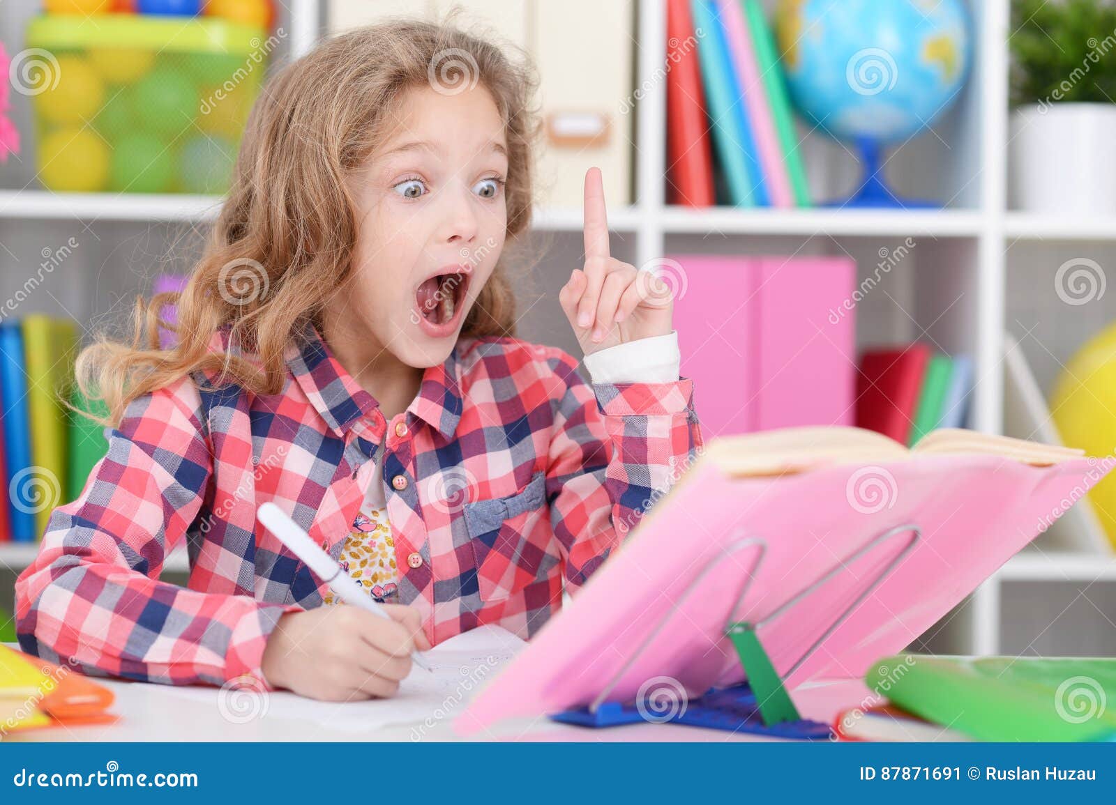 Cute girl does lessons stock image. Image of happy, little - 87871691