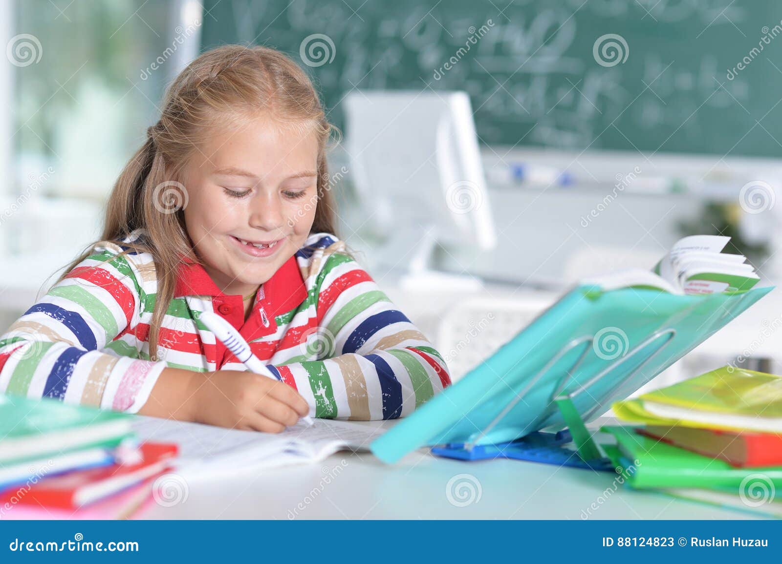 Cute girl does lessons stock image. Image of pretty, preschool - 88124823