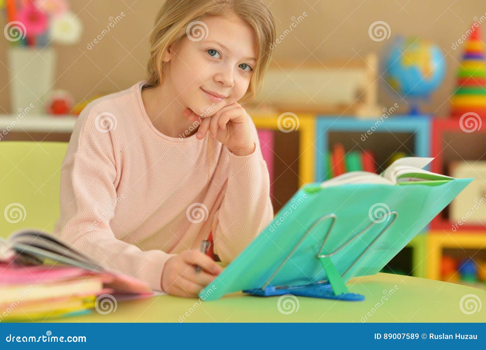 Cute girl does lessons stock image. Image of education - 89007589