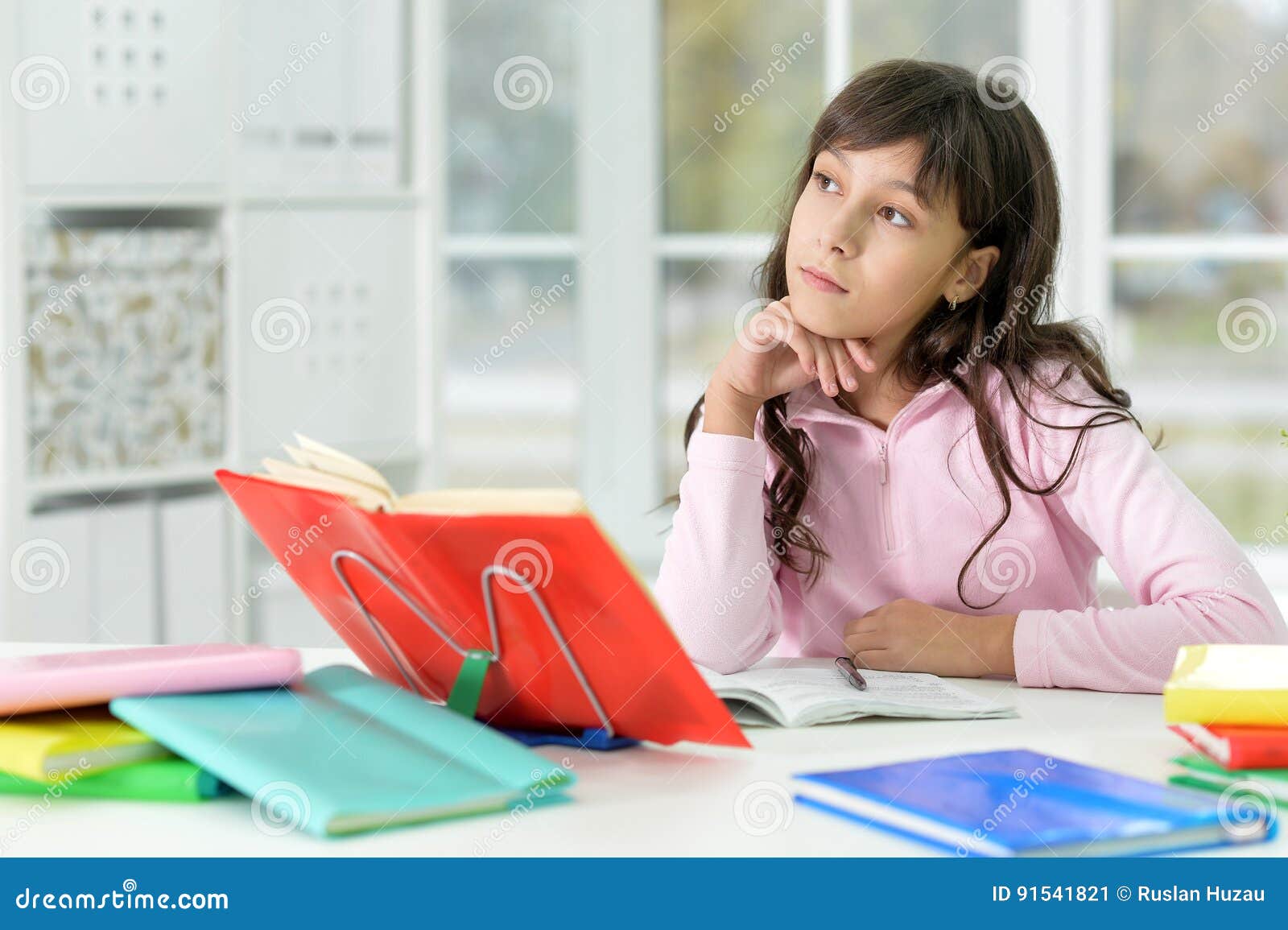 Cute girl does lessons stock image. Image of people, childhood - 91541821