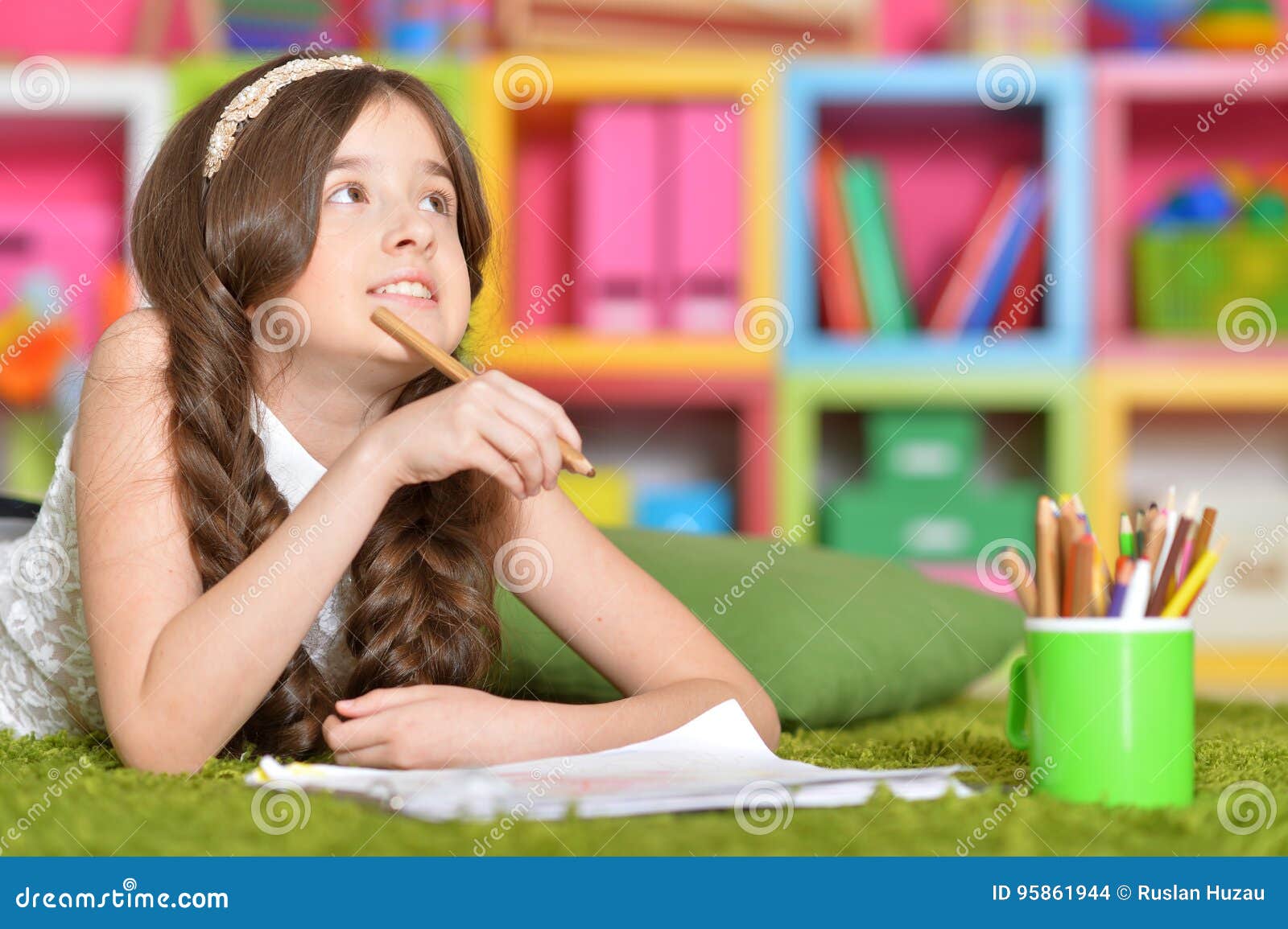 Cute girl doing homework stock photo. Image of pencils - 95861944