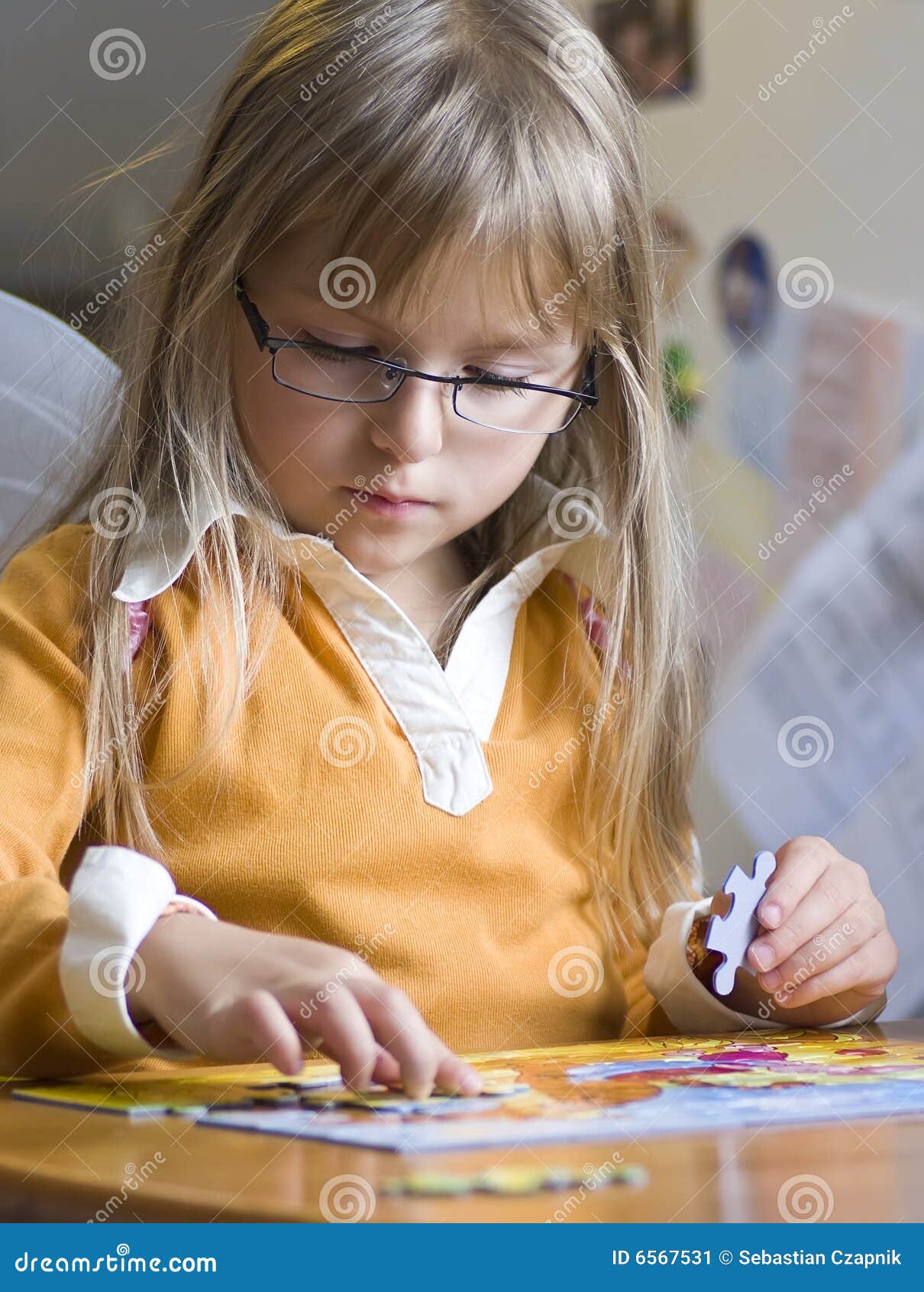 Cute Girl Doing Jigsaw Puzzle Stock Image - Image of glasses, game: 6567531