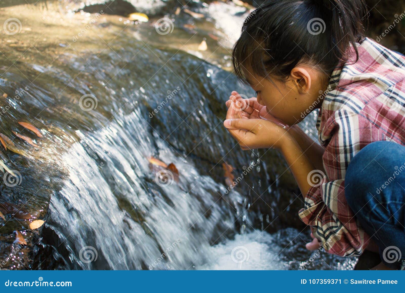Cute Girl Drinking Water from Waterfall Stock Image - Image of ...