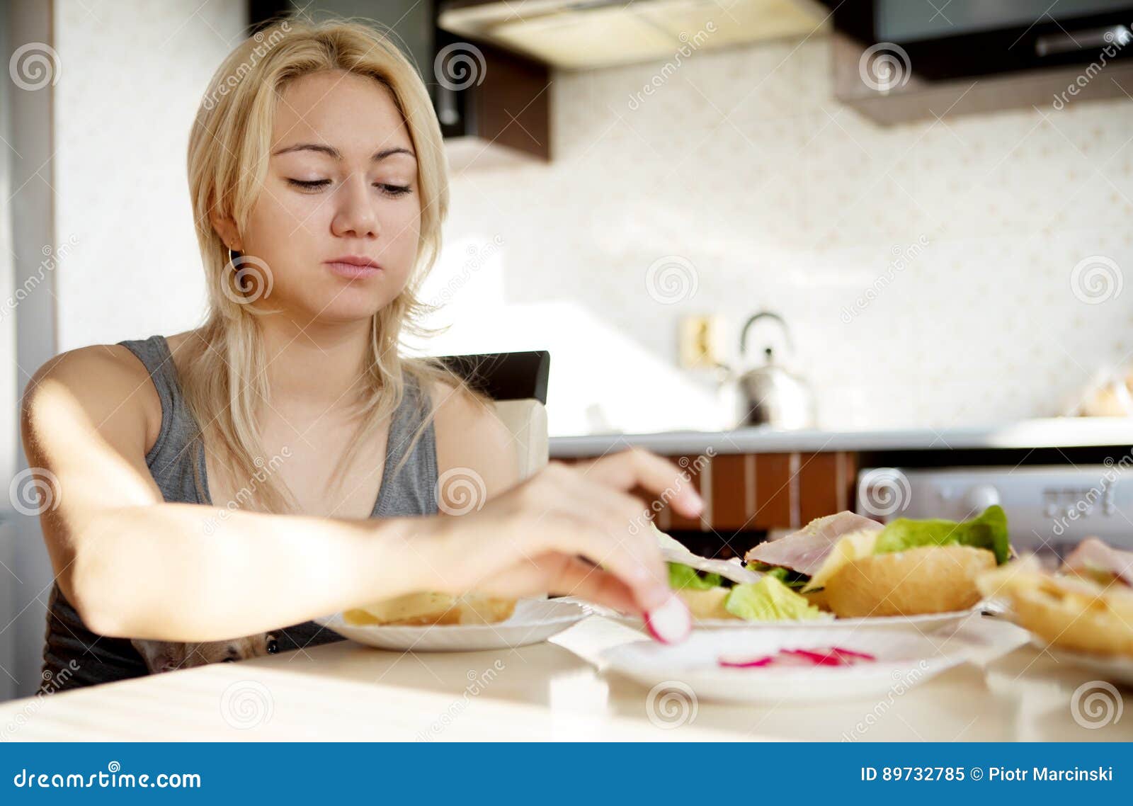 Cute girl eating brakfast stock image. Image of student - 89732785