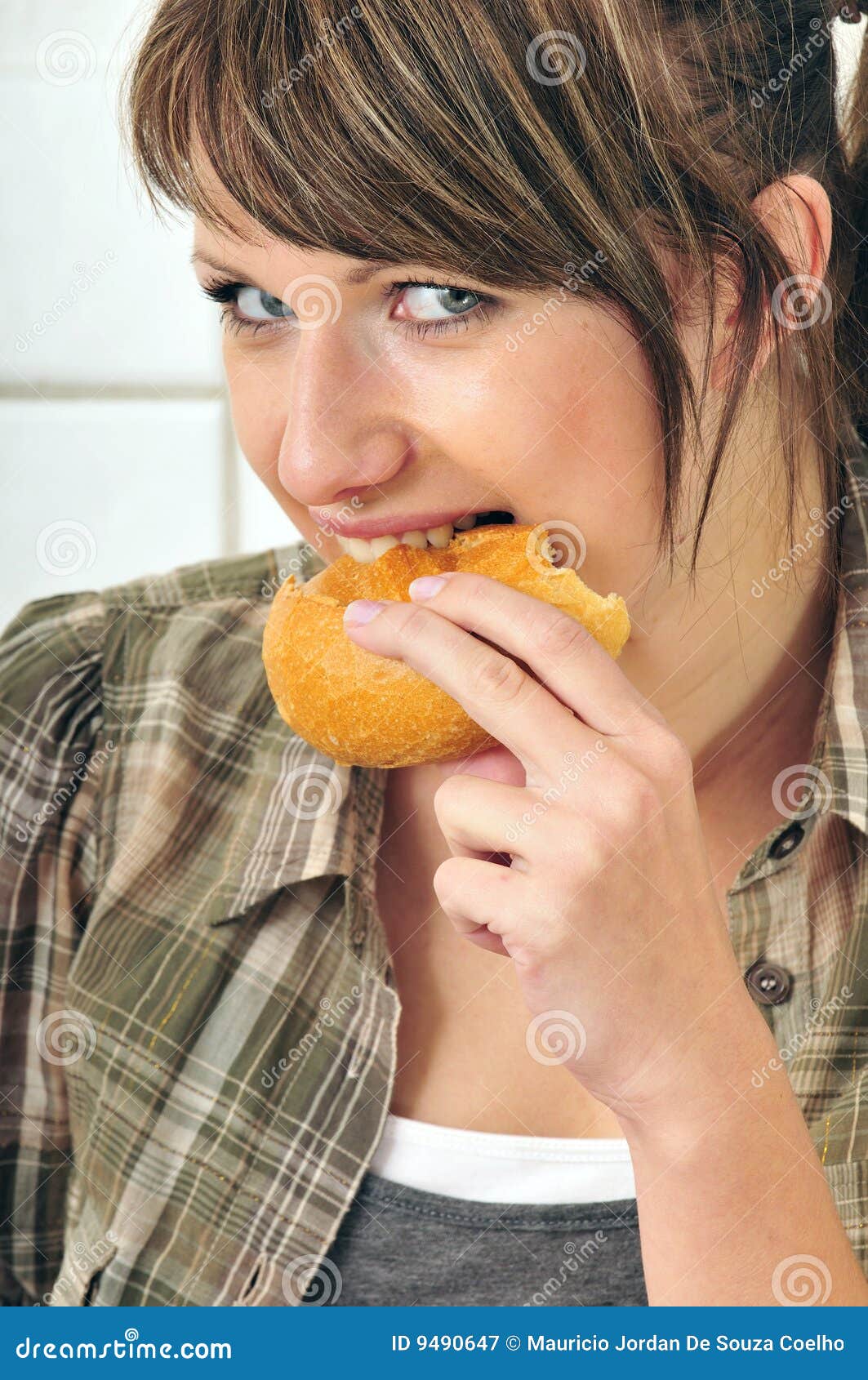 Cute Girl Eating a Bread Roll Stock Image - Image of bread, cute: 9490647