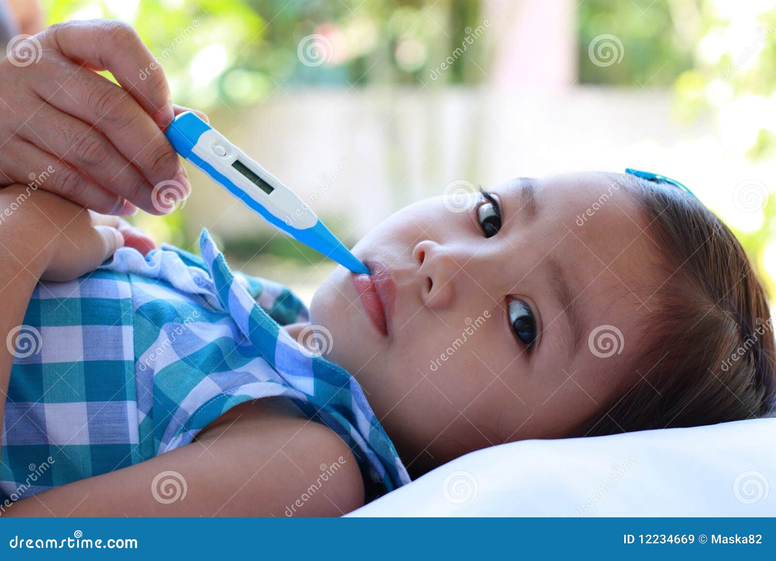 Cute girl with a fever stock image. Image of influenza - 12234669