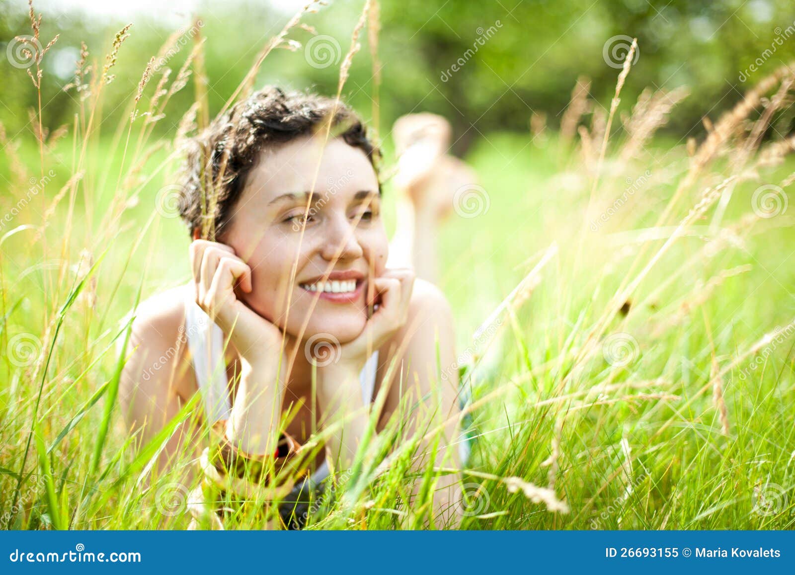Cute girl on green field stock image. Image of flower - 26693155