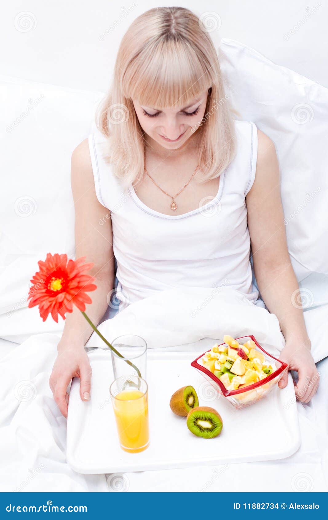 Cute girl has a breakfast stock photo. Image of happiness - 11882734