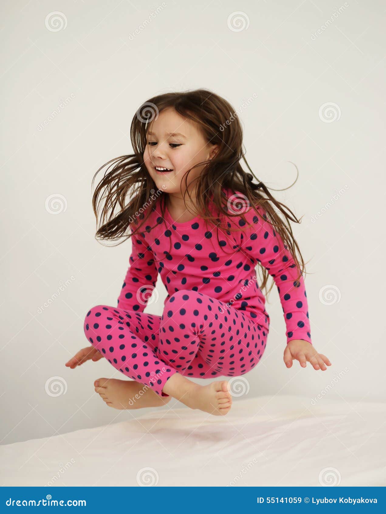 Cute girl jumping on the stock image. Image of phone - 55141059
